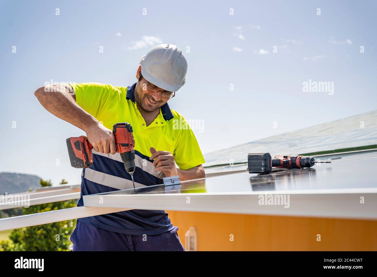 Technician installing hi-res stock photography and images - Alamy