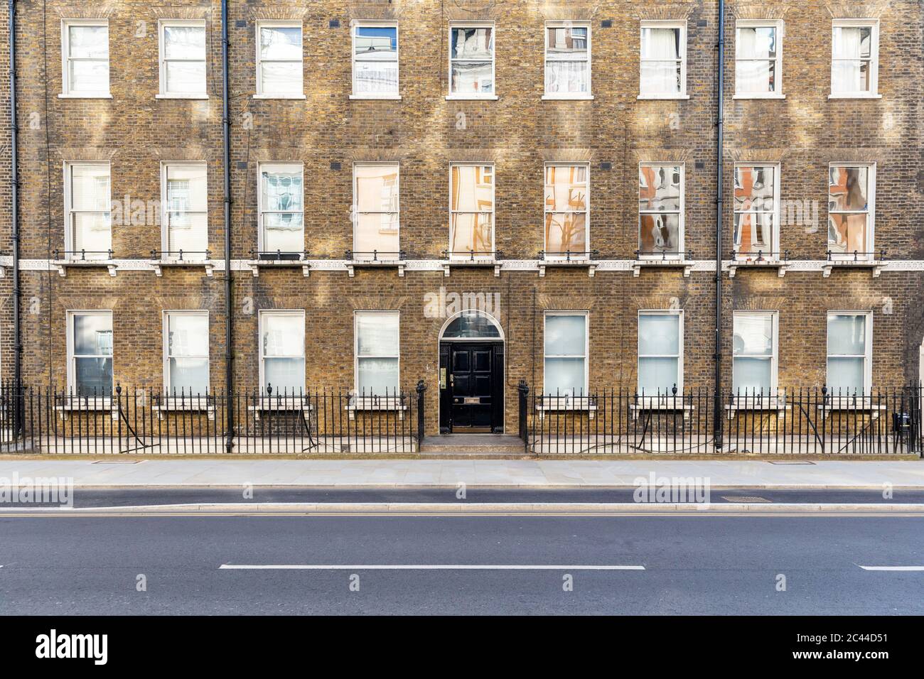 UK, London, Brick buildings in empty street during curfew in Bloomsbury ...