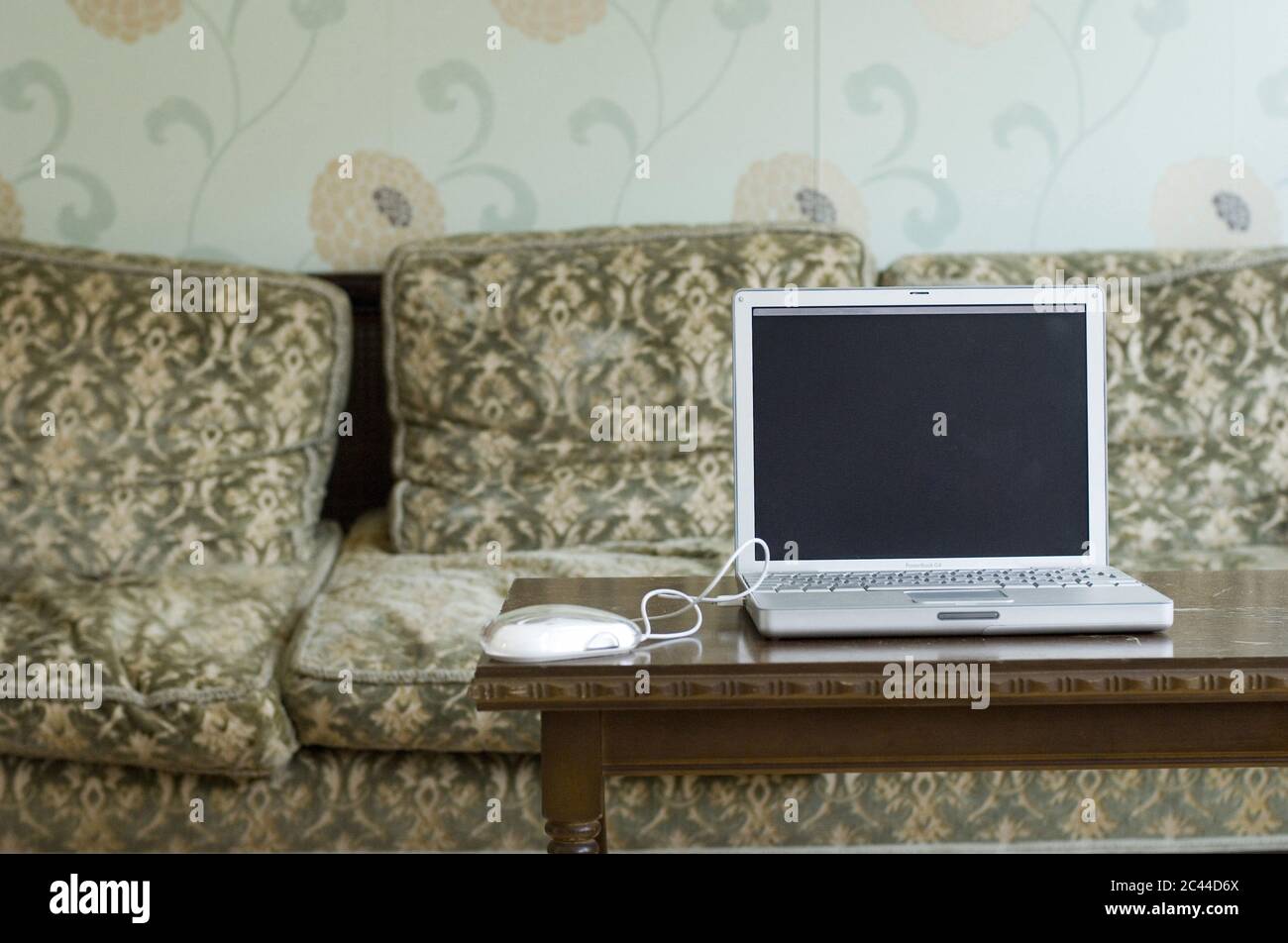 Laptop in the living room Stock Photo - Alamy