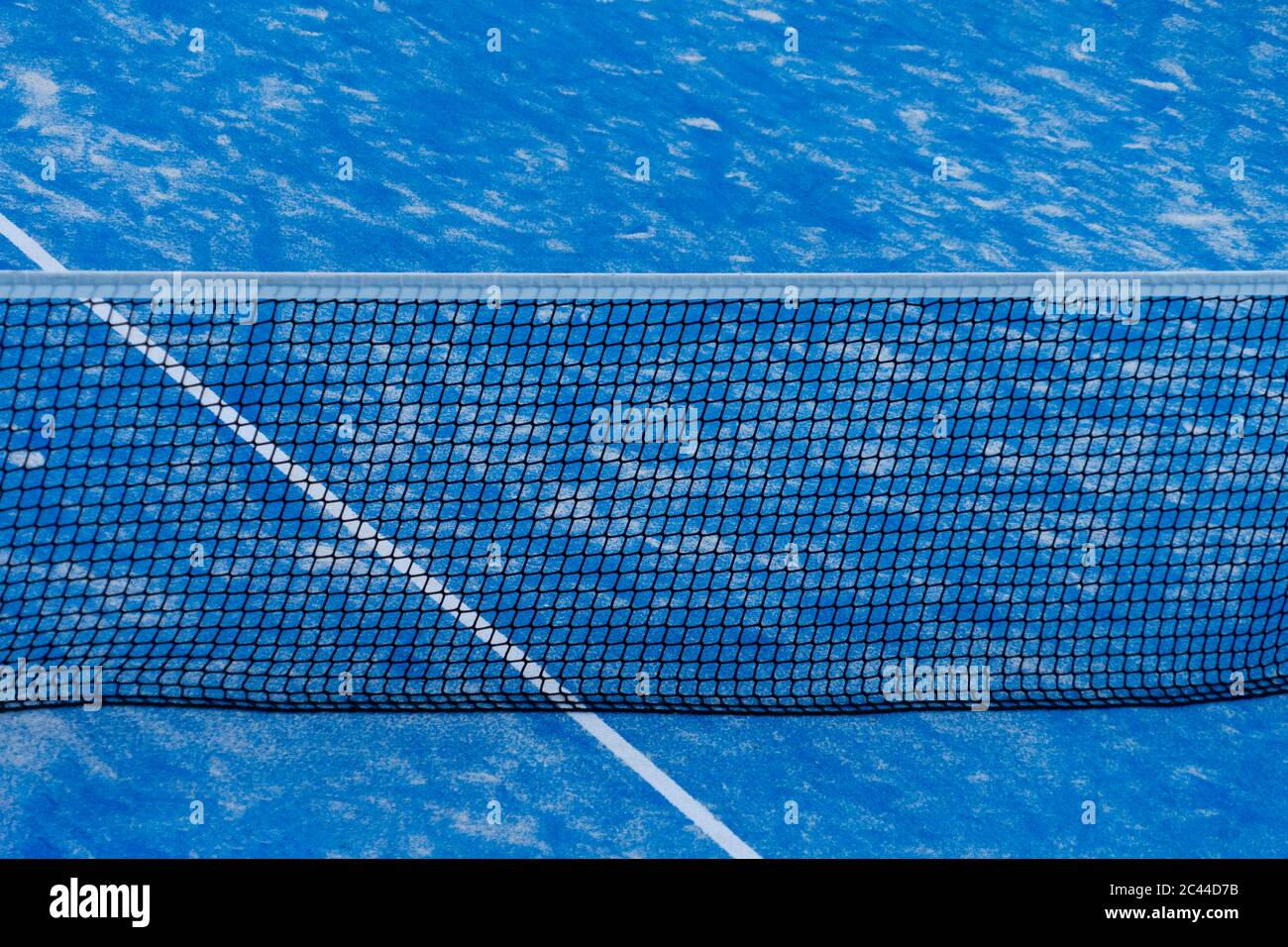 Paddle tennis net and blue court field background. Close up Stock Photo ...