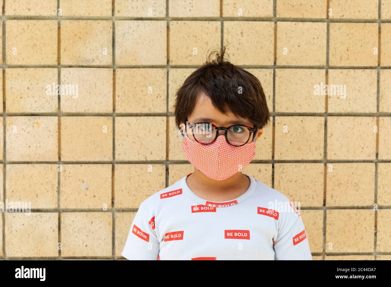 Child wearing red shirt hi-res stock photography and images - Alamy