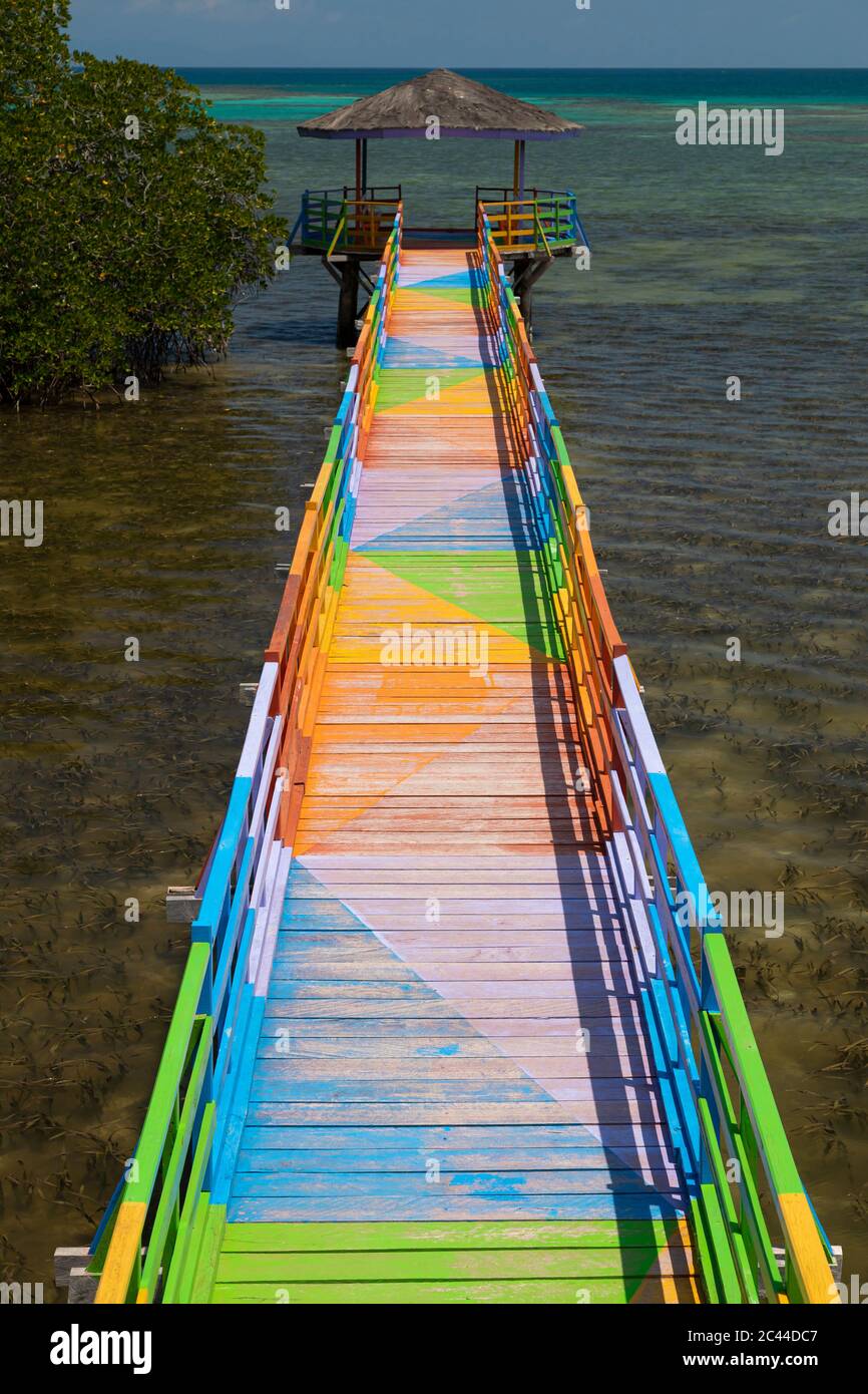 Wooden promenade decorated with vibrant and diverse colors, facing the ...