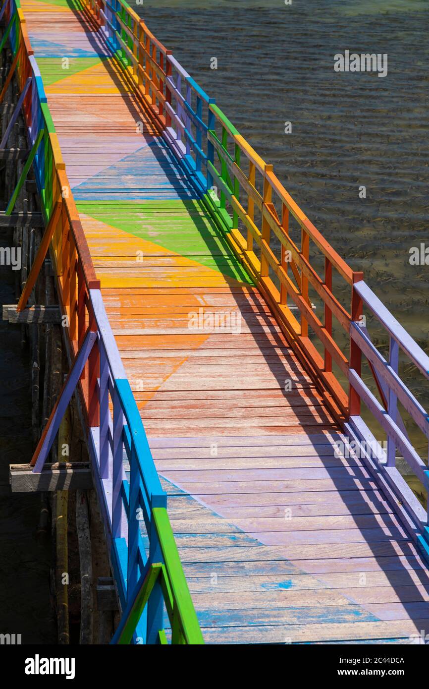 Wooden promenade decorated with vibrant and diverse colors, facing the ...