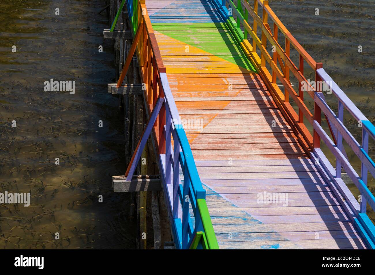 Wooden promenade decorated with vibrant and diverse colors, facing the ...