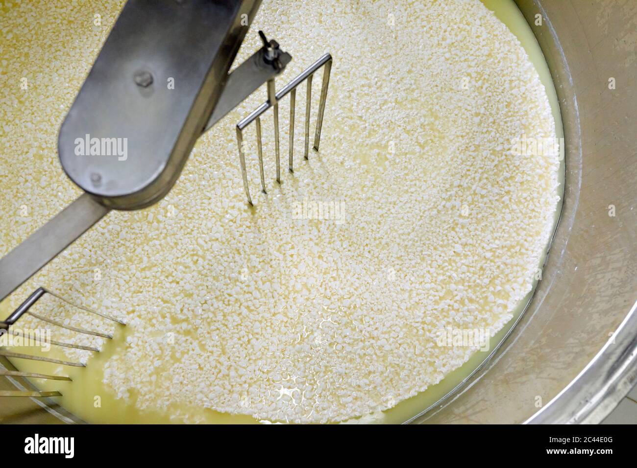 Cheese factory, cheese harp and whey Stock Photo - Alamy