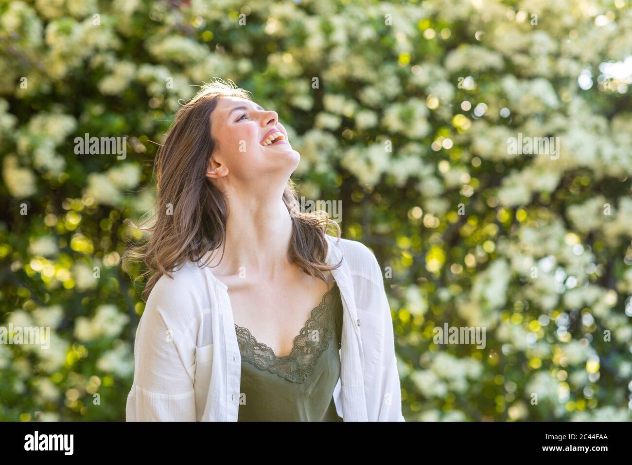 Laughing woman outdoors hi-res stock photography and images - Alamy