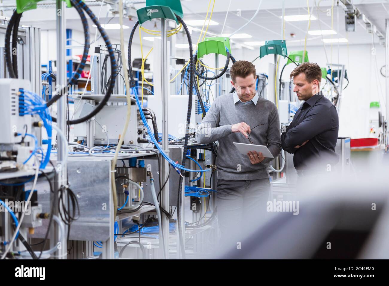 Two men using the tablet hi-res stock photography and images - Alamy