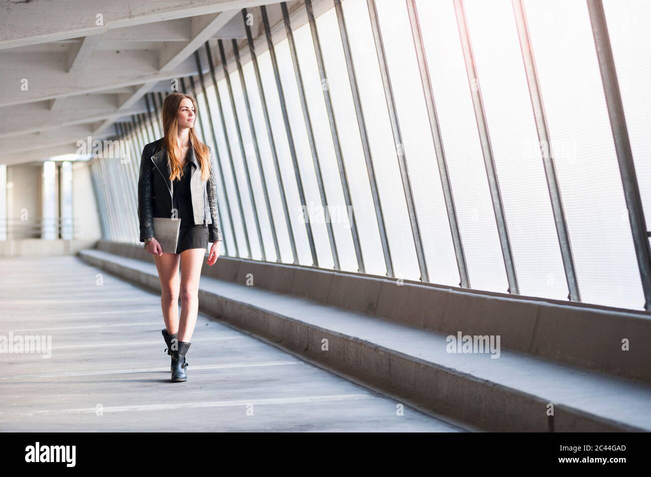 Business woman walking laptop hi-res stock photography and images - Alamy