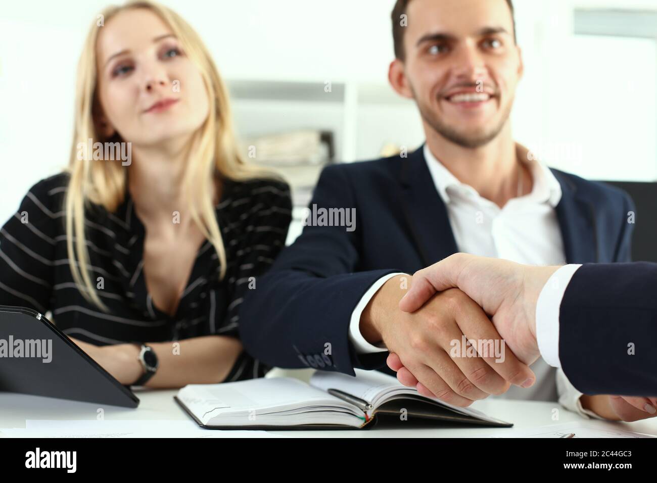 Handsome joyful man shaking hi-res stock photography and images - Alamy