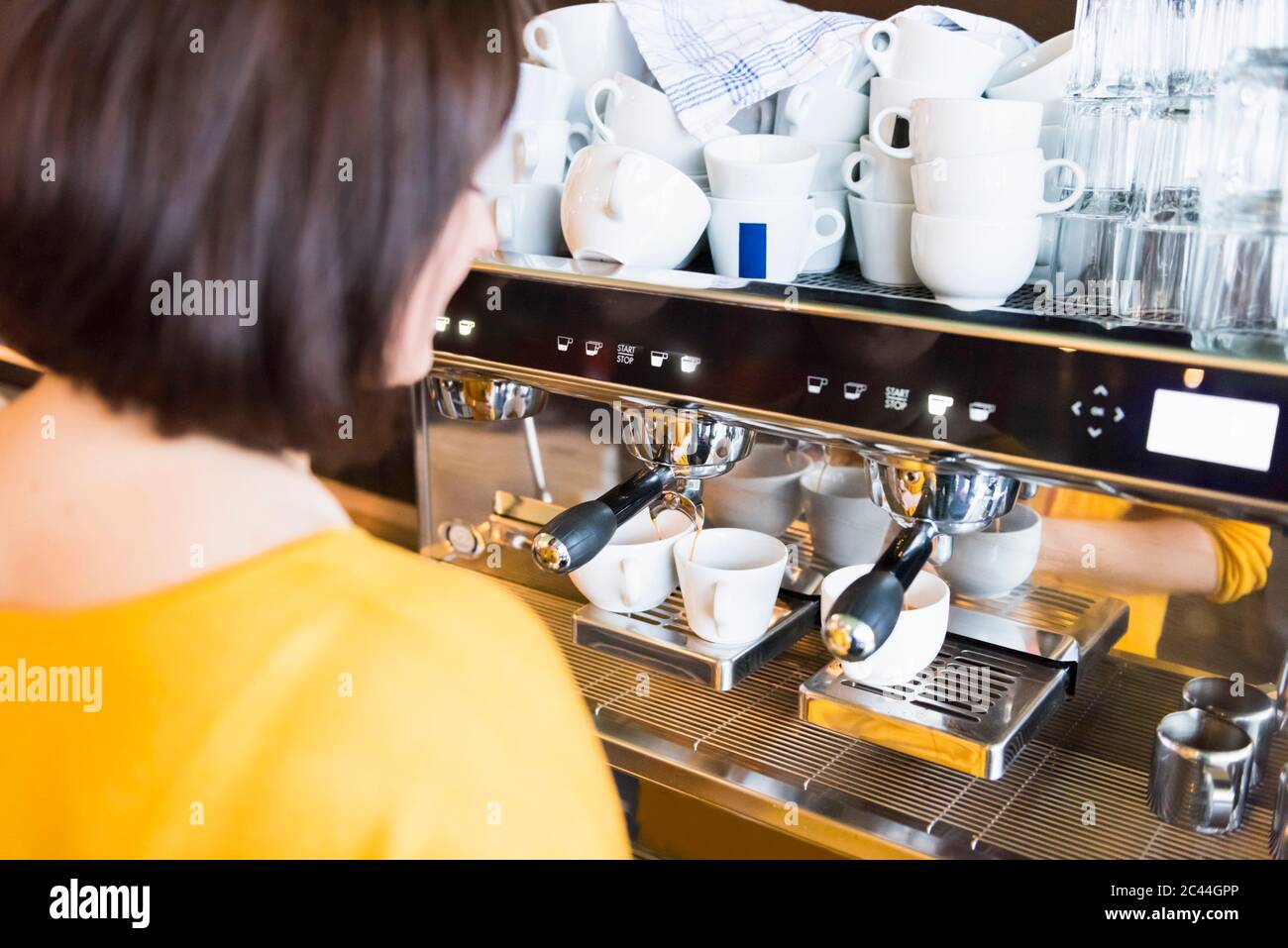 Female coffee maker hi-res stock photography and images - Alamy