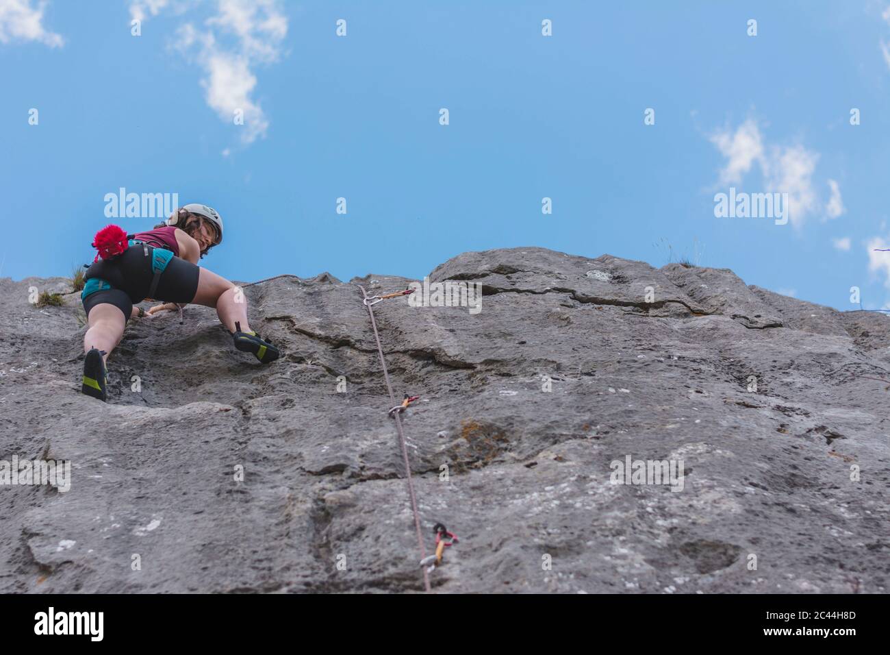 Woman climbing down rope hi-res stock photography and images - Alamy