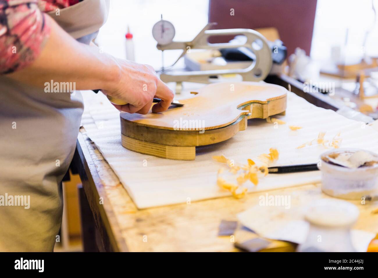 Female violin maker at work Stock Photo - Alamy