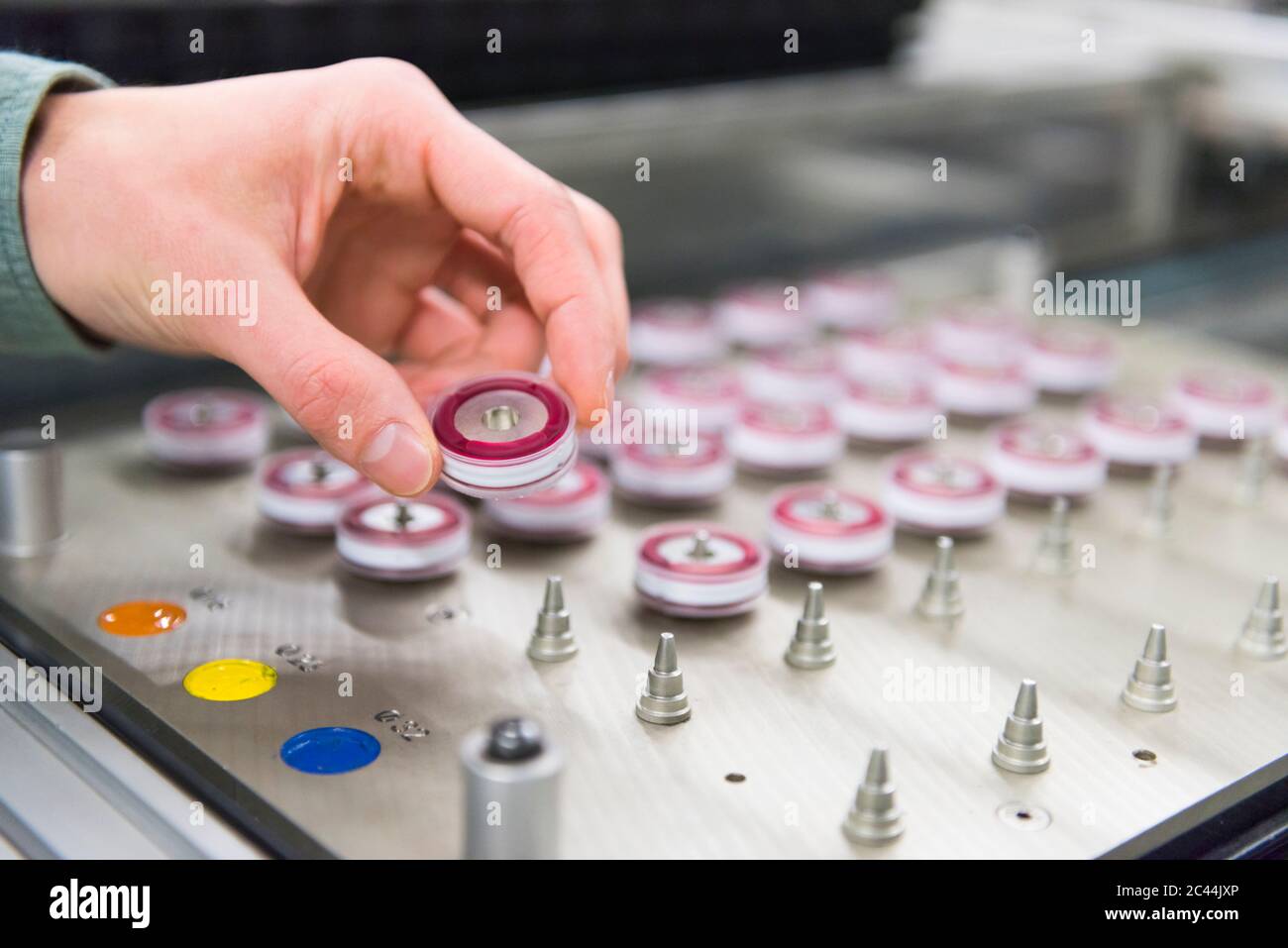 Hand and product hi-res stock photography and images - Alamy