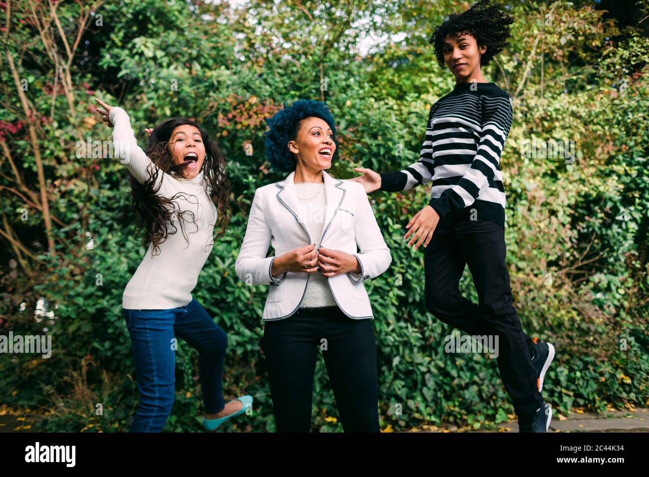 Children jumping hi-res stock photography and images - Alamy