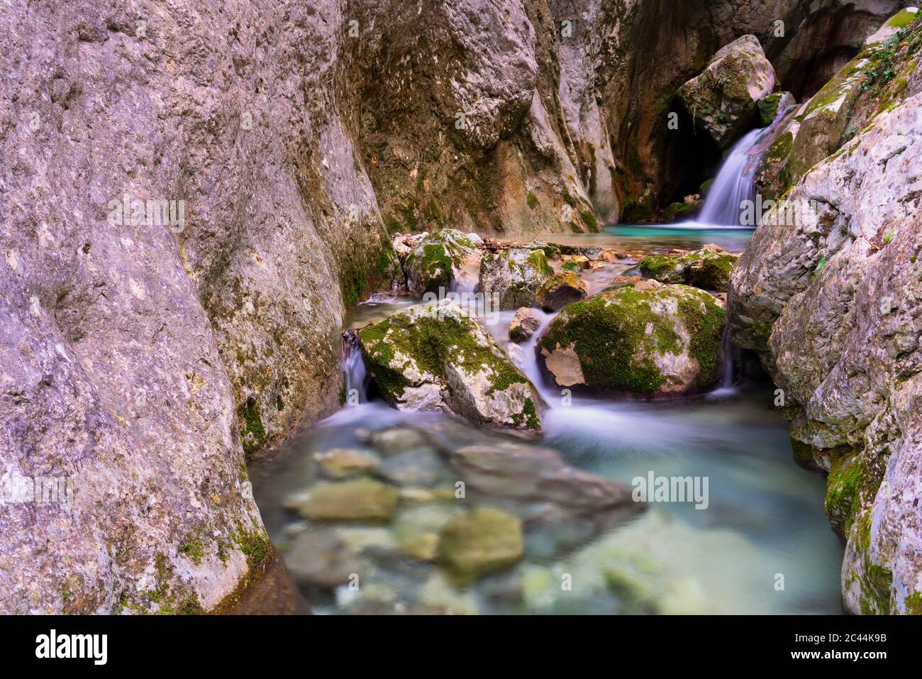 Italy, Stream flowing in Forra di Rio Freddo canyon cutting through ...
