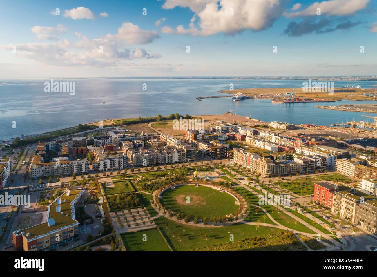 Sweden, Scania, Malmo, Aerial view of park at Vastra Hamnen with sea in ...