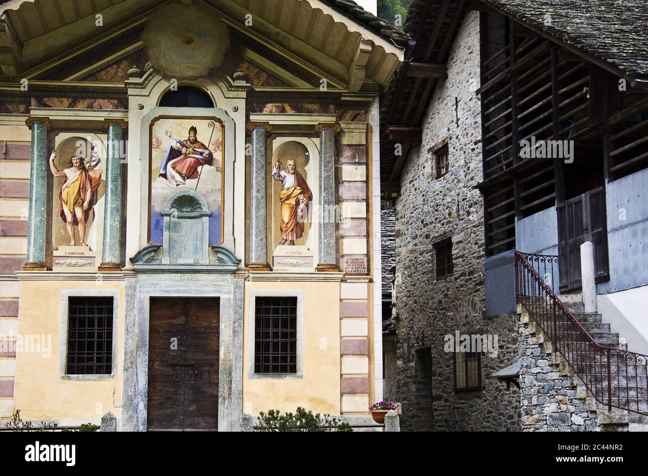 Facade of a beautiful ancient monastery along the brick house Stock ...