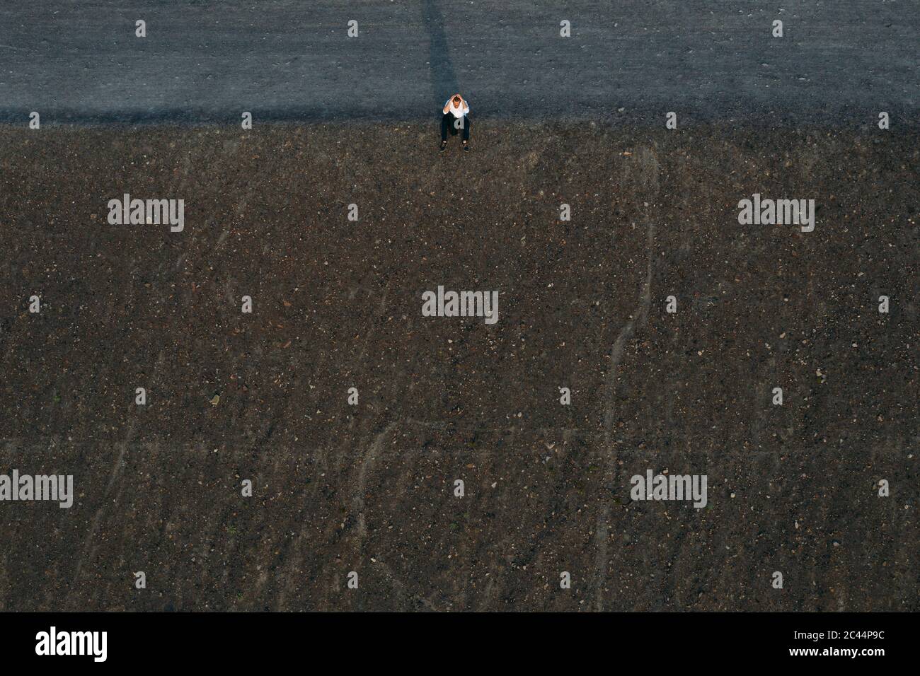 Aerial view of person sitting hi-res stock photography and images - Alamy