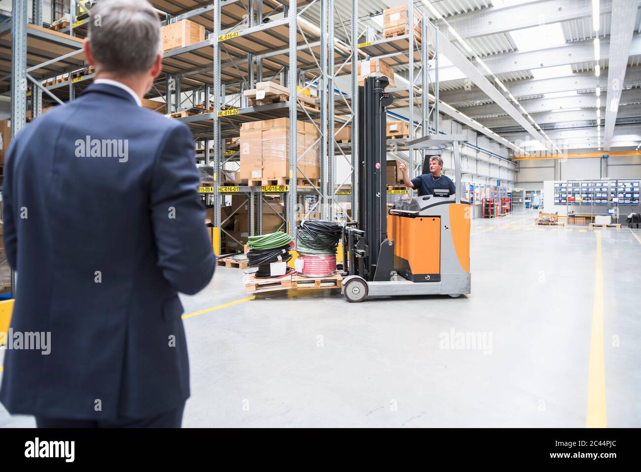 Warehouse high rack forklift hi-res stock photography and images - Alamy