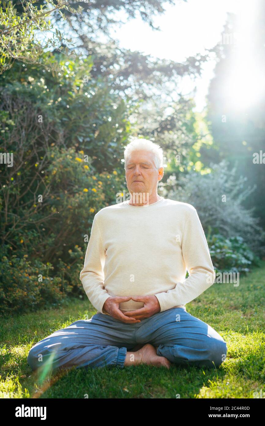 Man meditating nature hi-res stock photography and images - Alamy
