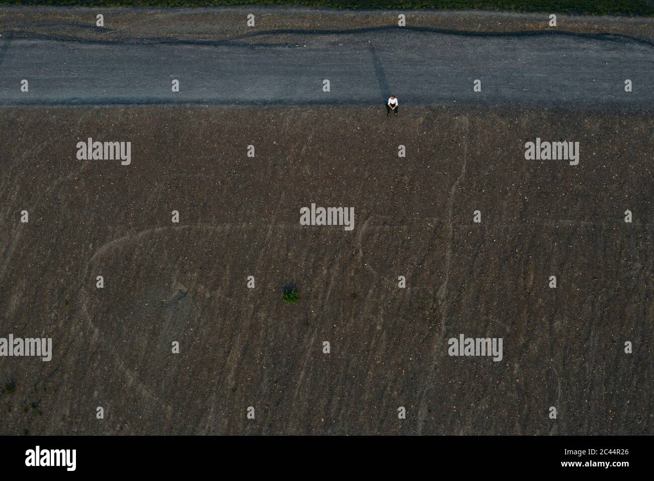 Aerial view of person sitting hi-res stock photography and images - Alamy