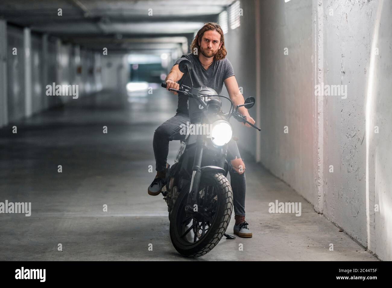 Young man on motorcycle hi-res stock photography and images - Alamy