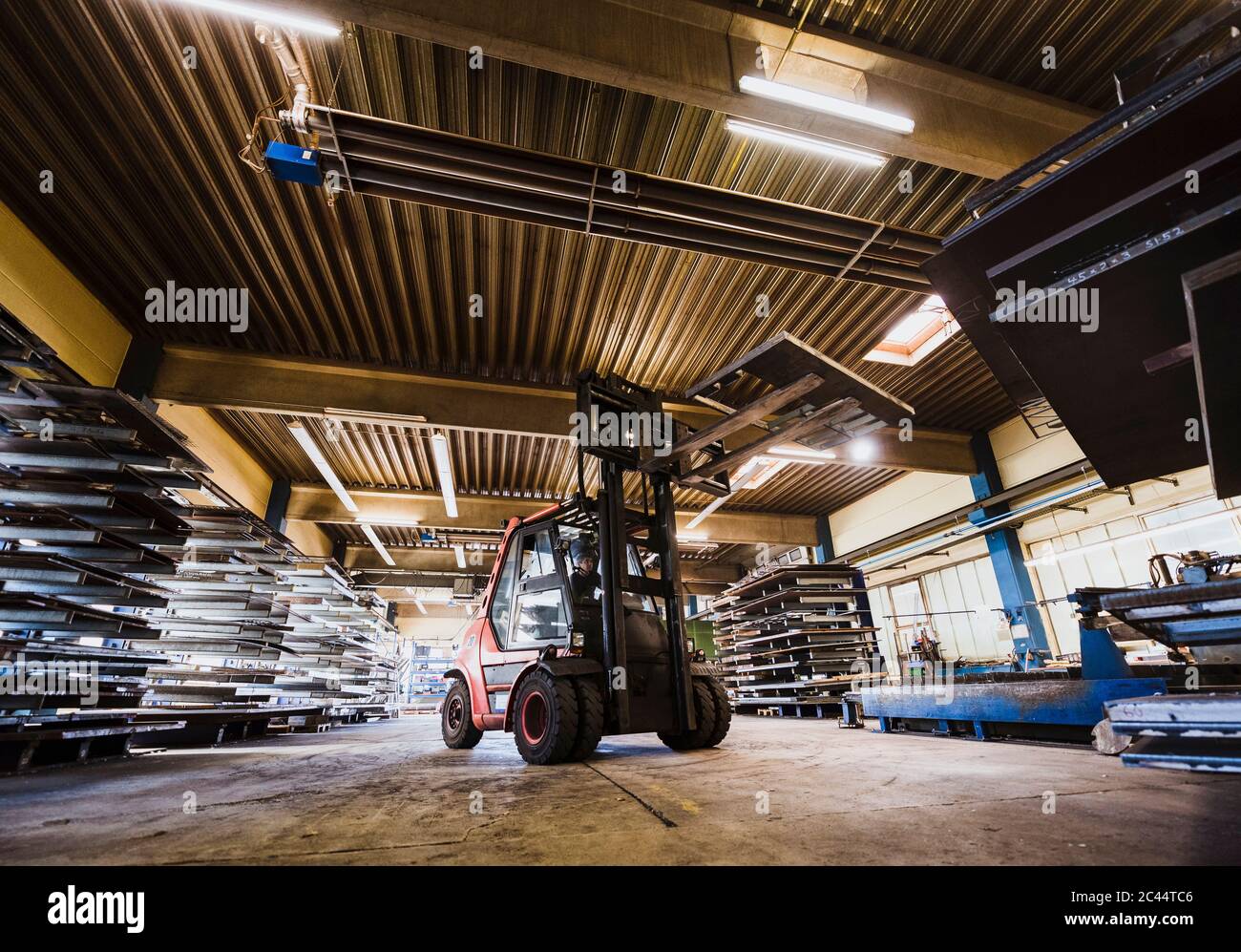 Forklift in a factory Stock Photo - Alamy