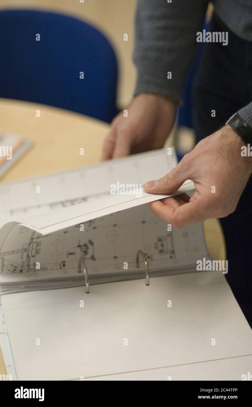 Man with file folder Stock Photo - Alamy