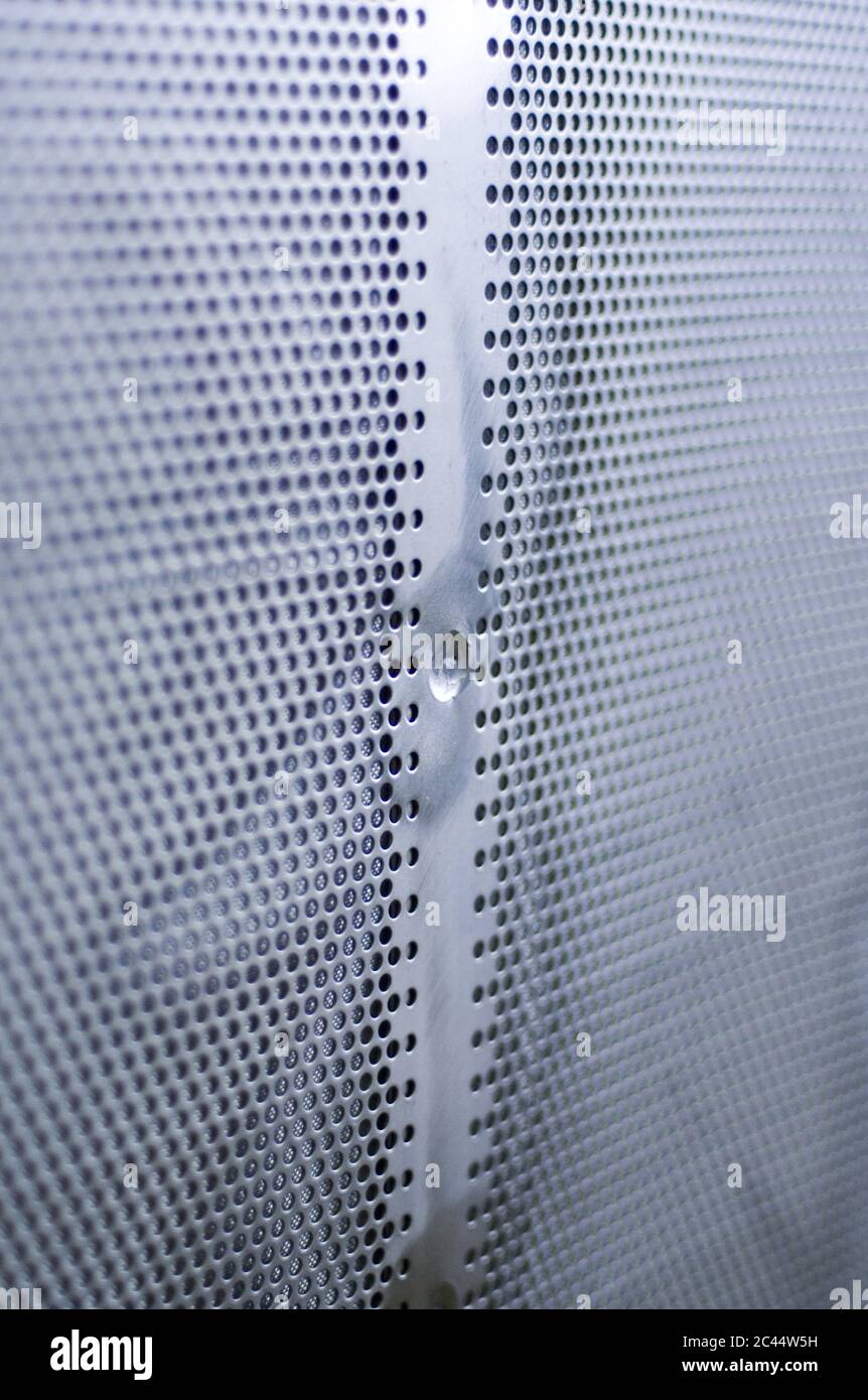Perforated sheet hi-res stock photography and images - Alamy