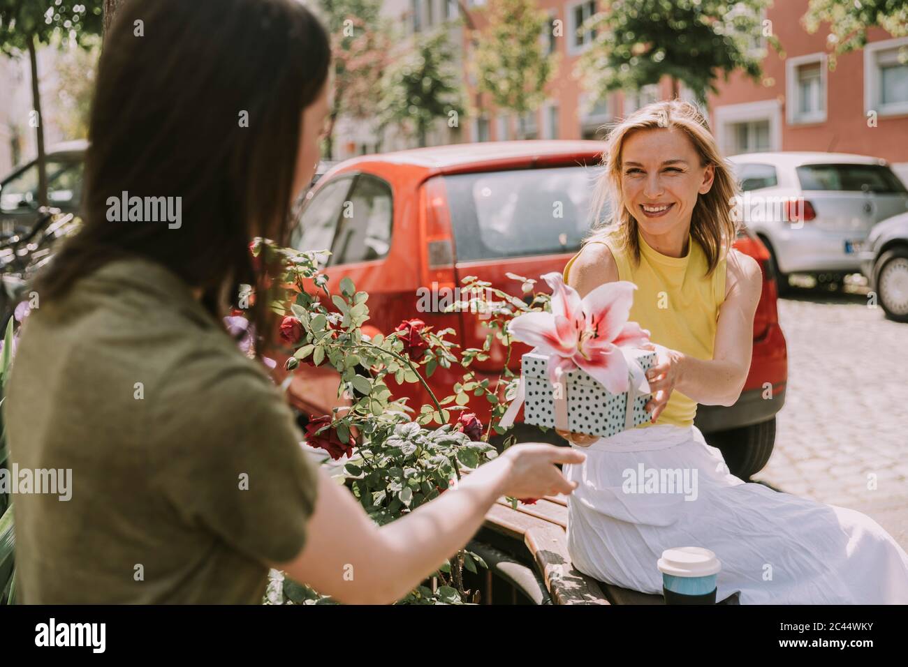 Handing of gift hi-res stock photography and images - Alamy
