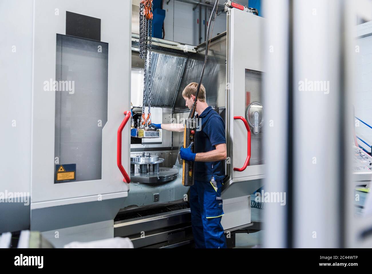 Crane hook young factory hi-res stock photography and images - Alamy