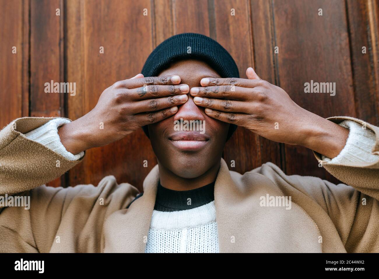 Woman Young Covering Eyes Hand High Resolution Stock Photography and ...