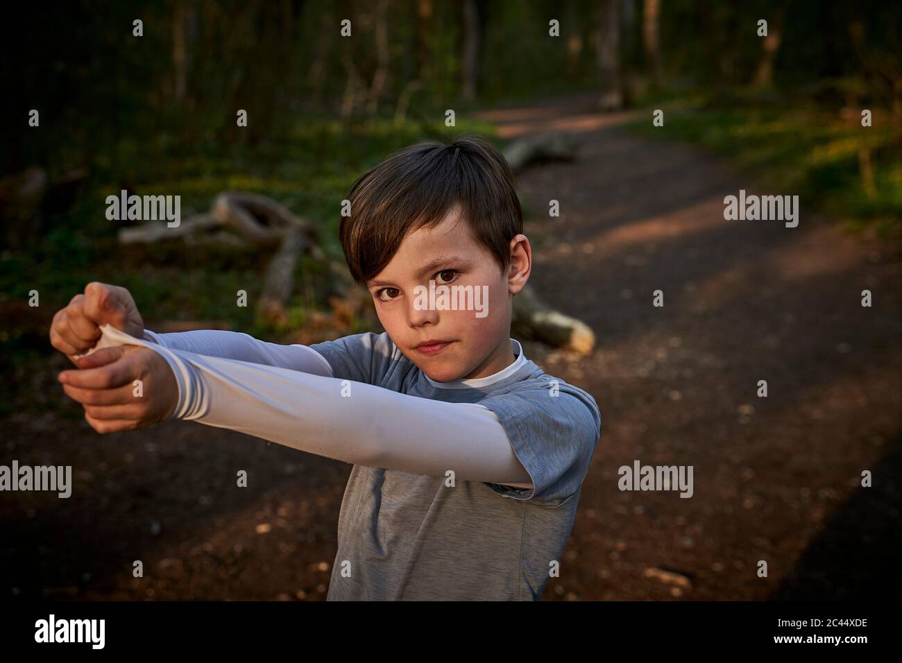 Pulling up sleeve hi-res stock photography and images - Alamy