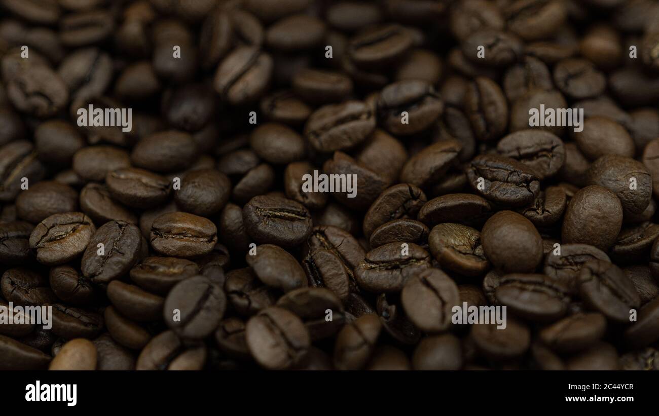 Lots of coffee beans on white backgrownd. Heart of coffe beans. Coffe ...
