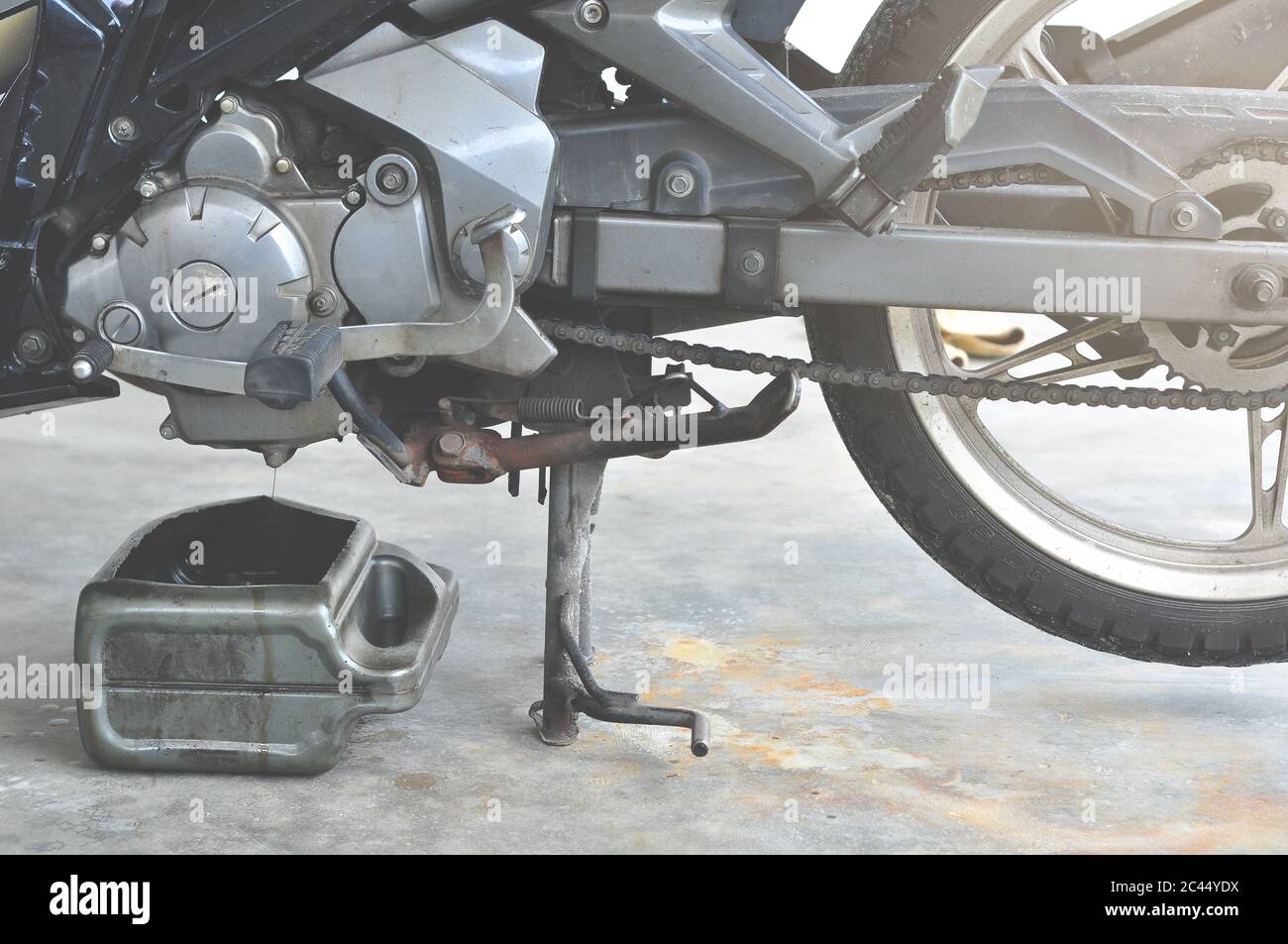 Pouring yellow liquid motorcycle fuel hi-res stock photography and ...