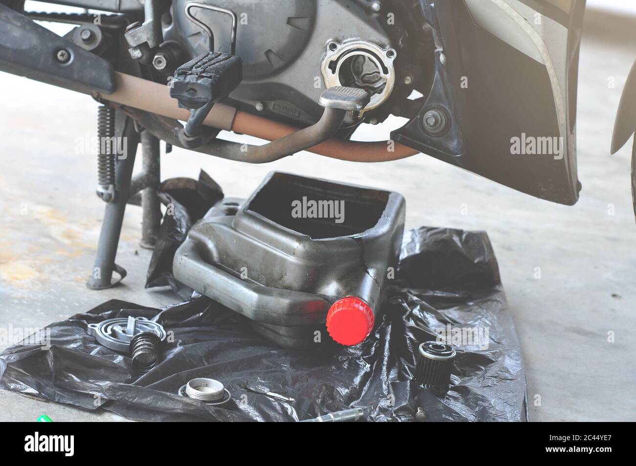 Close-up Motorcycle Oil Change. concept of automotive Stock Photo - Alamy