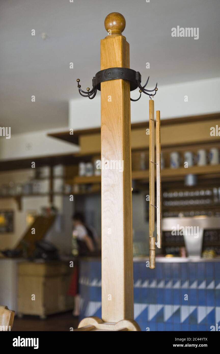 Newspaper rack in a pub Stock Photo - Alamy
