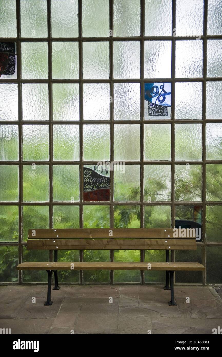 Bench and glass wall Stock Photo - Alamy