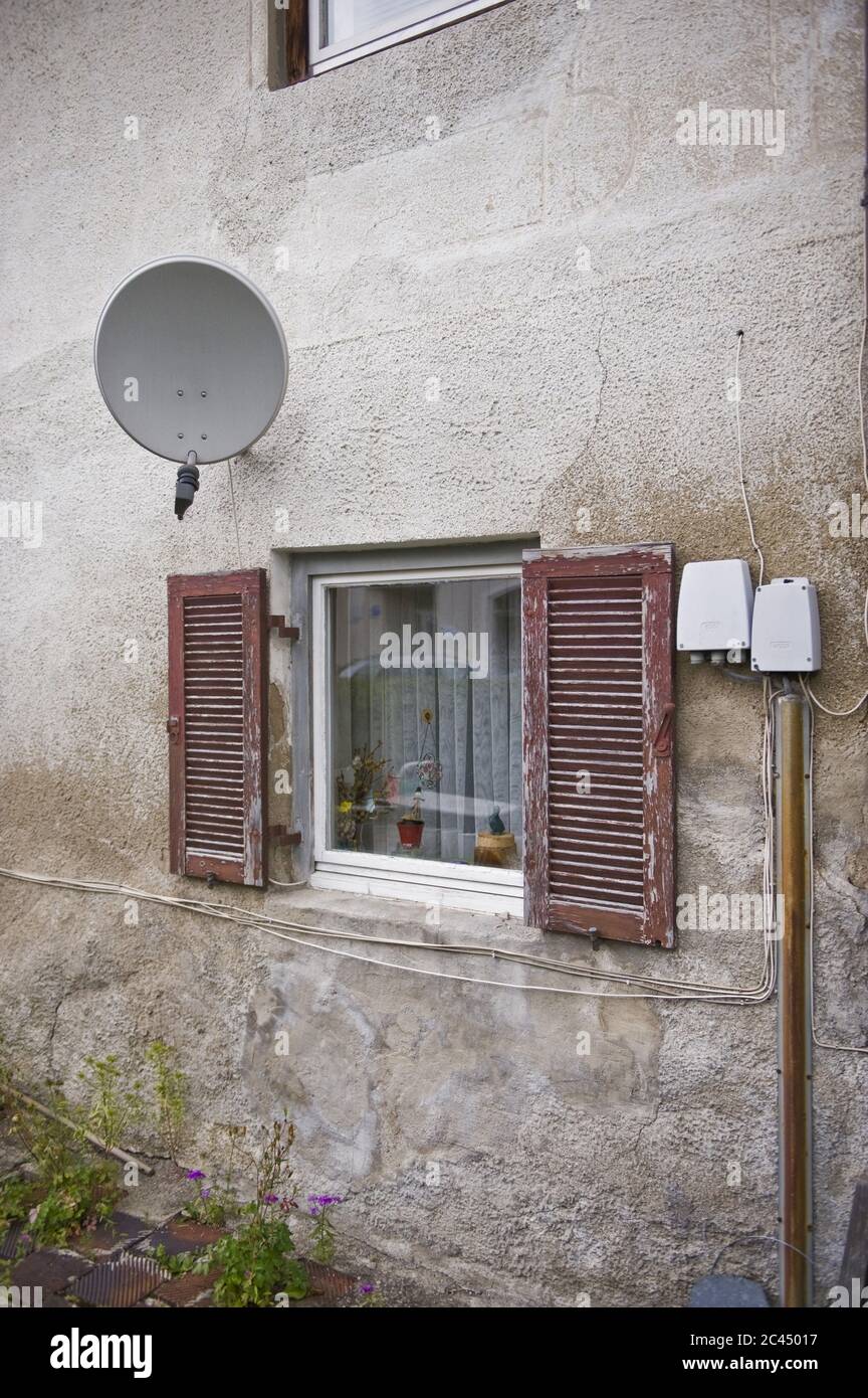 Window and satellite dish Stock Photo - Alamy