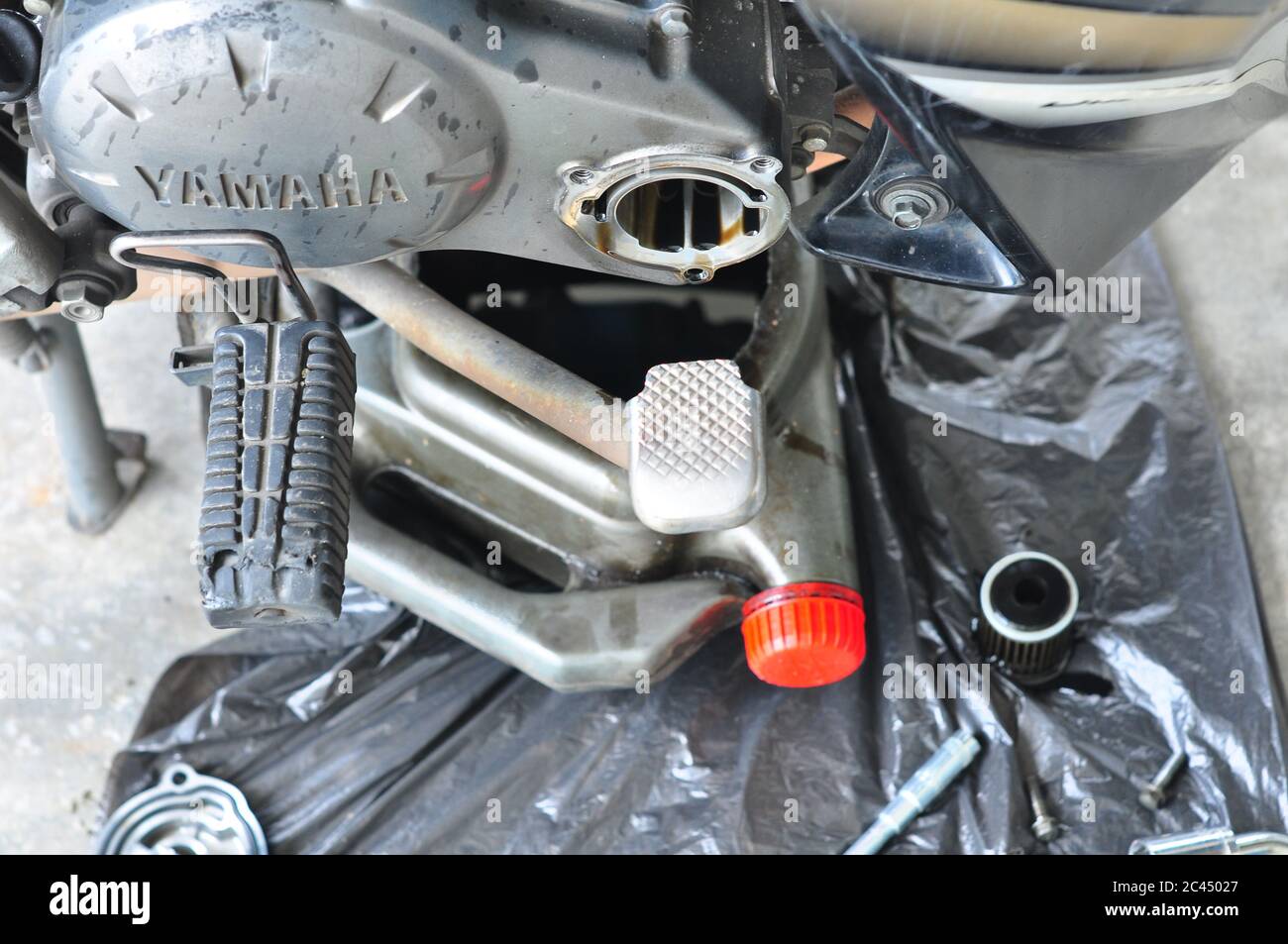 Pouring yellow liquid motorcycle fuel hi-res stock photography and ...