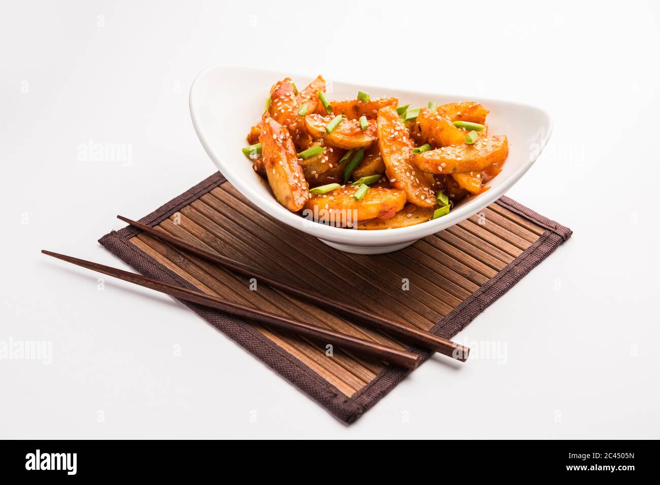Honey Chilli Potato is a popular Indian Chinese food Stock Photo - Alamy
