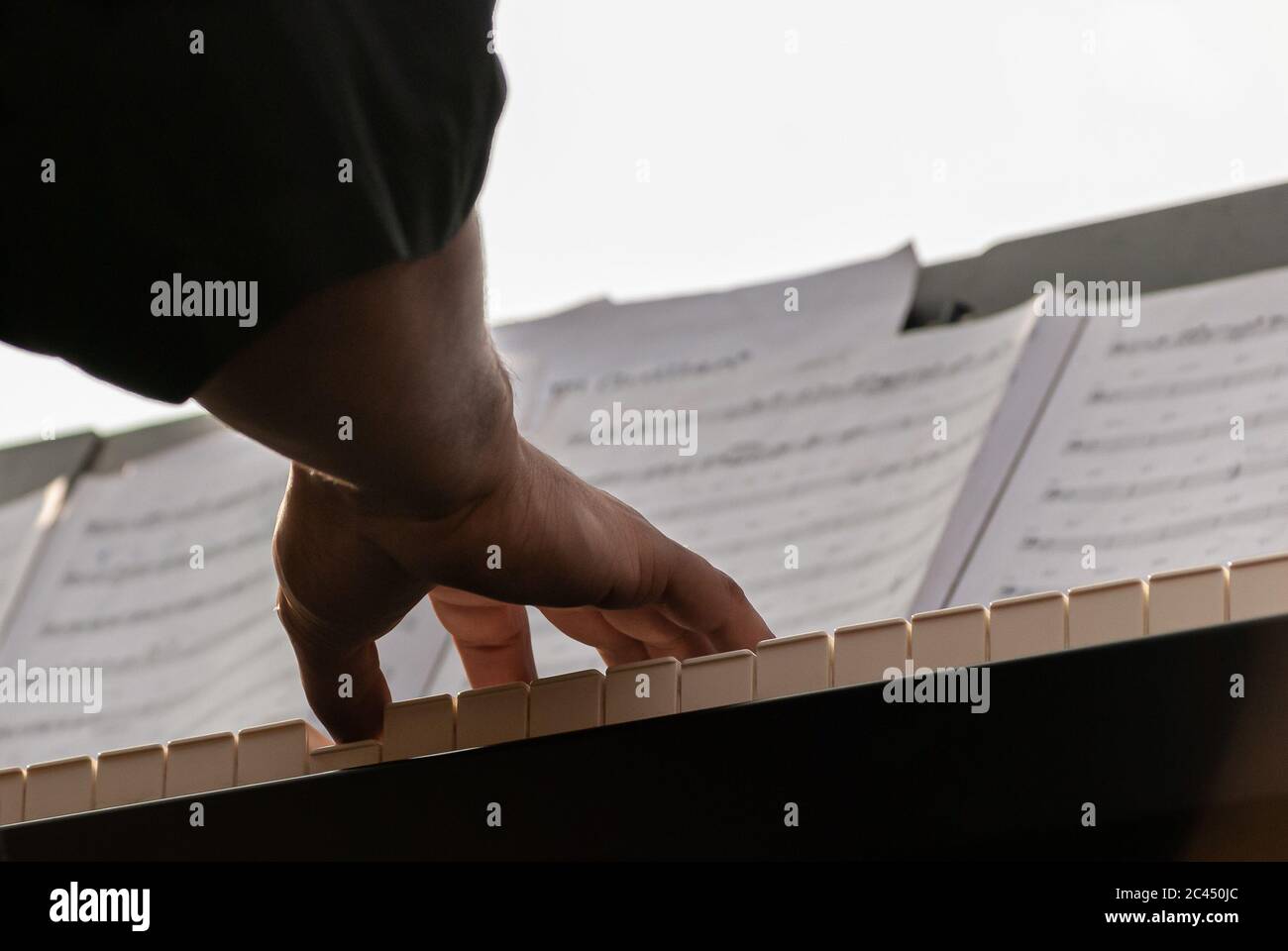 Piano keyboard song music notes hands playing hi-res stock photography ...