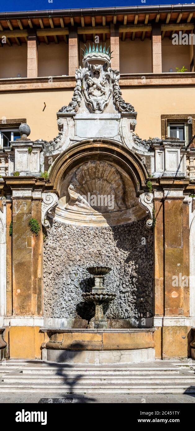 The beautiful fountain in St. Peter's Square, in Frascati, surmounted ...