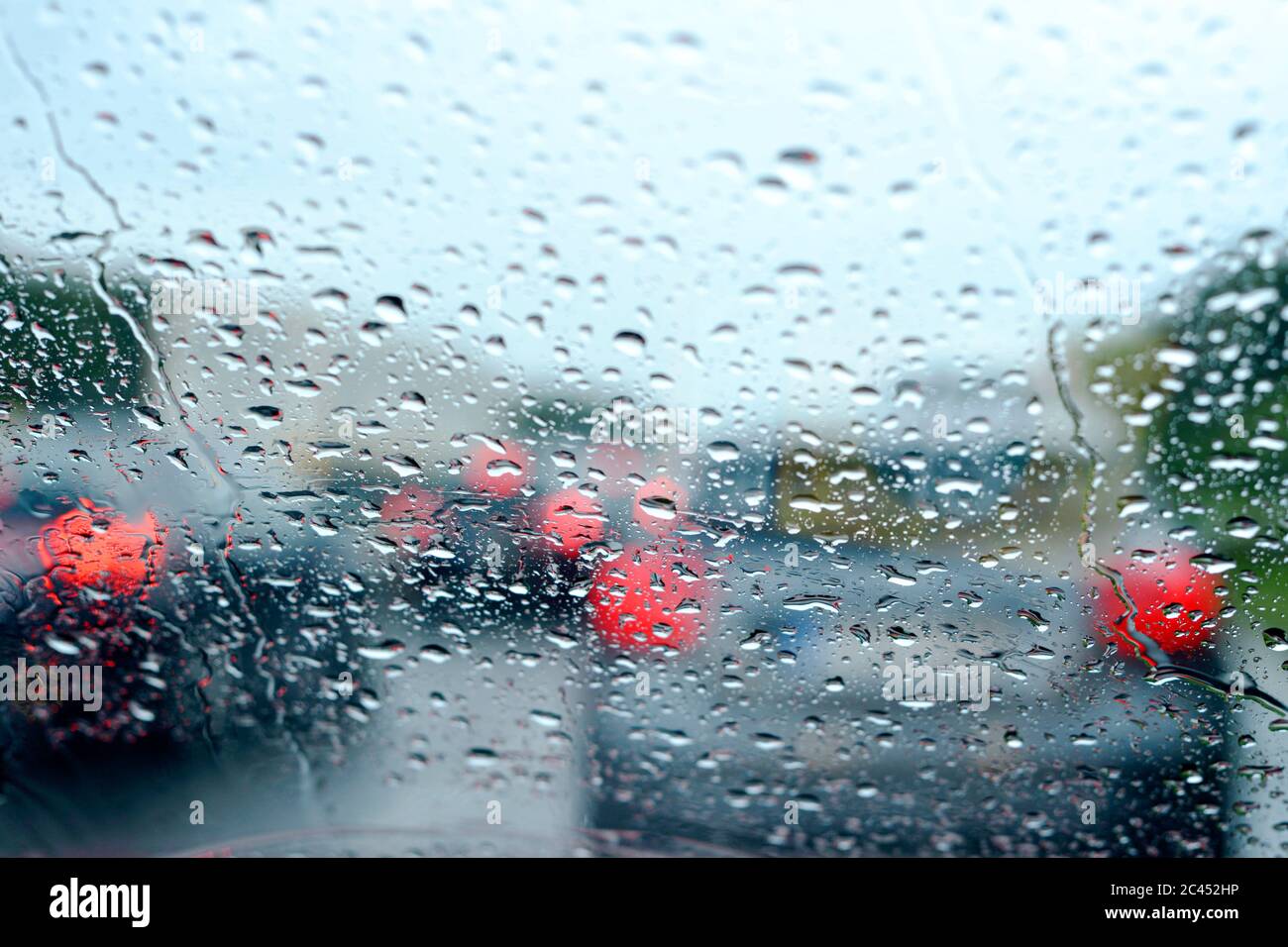 bad weather and rain traffic jam looking through the car window Stock ...