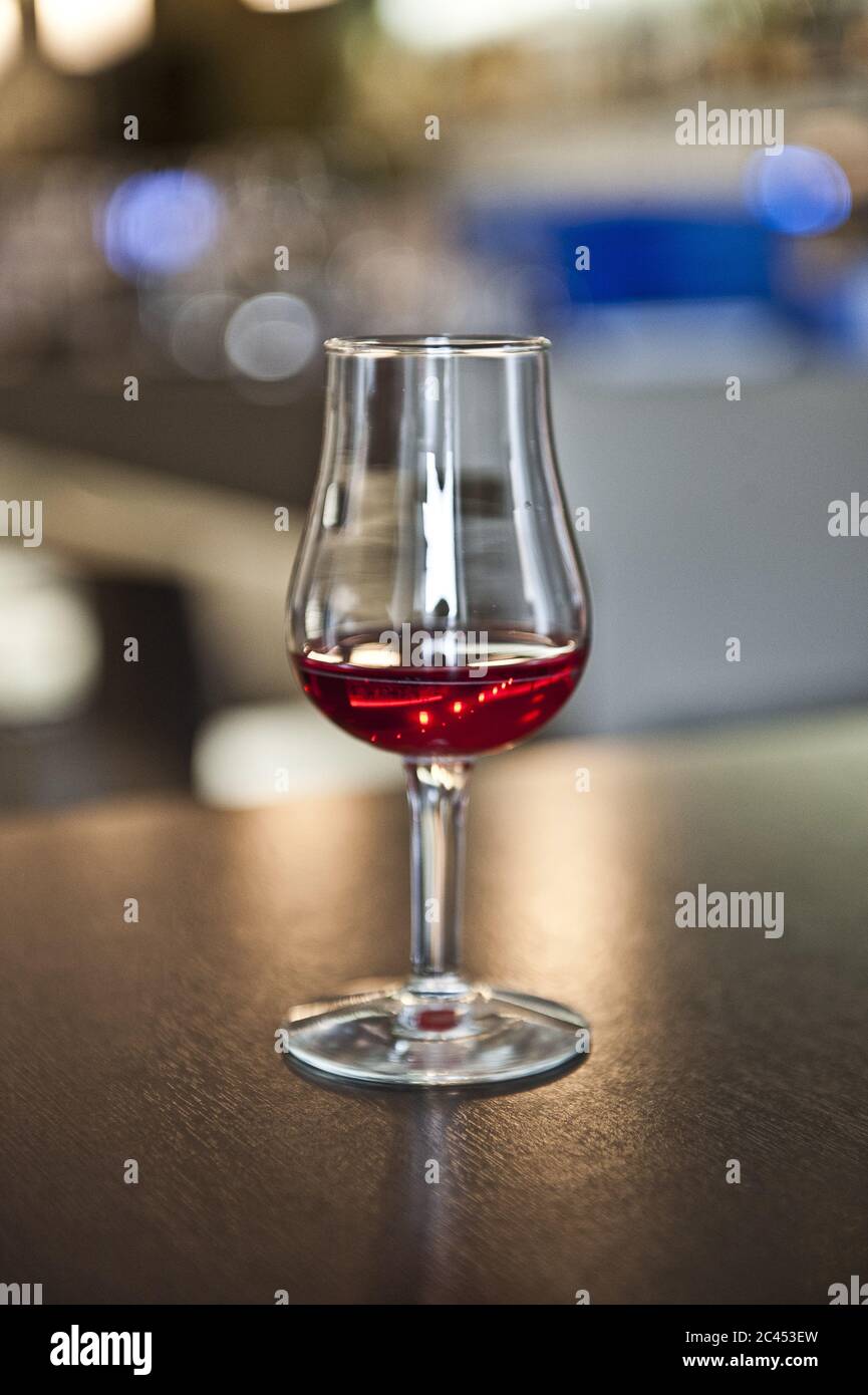 Red liqueur in a glass Stock Photo - Alamy
