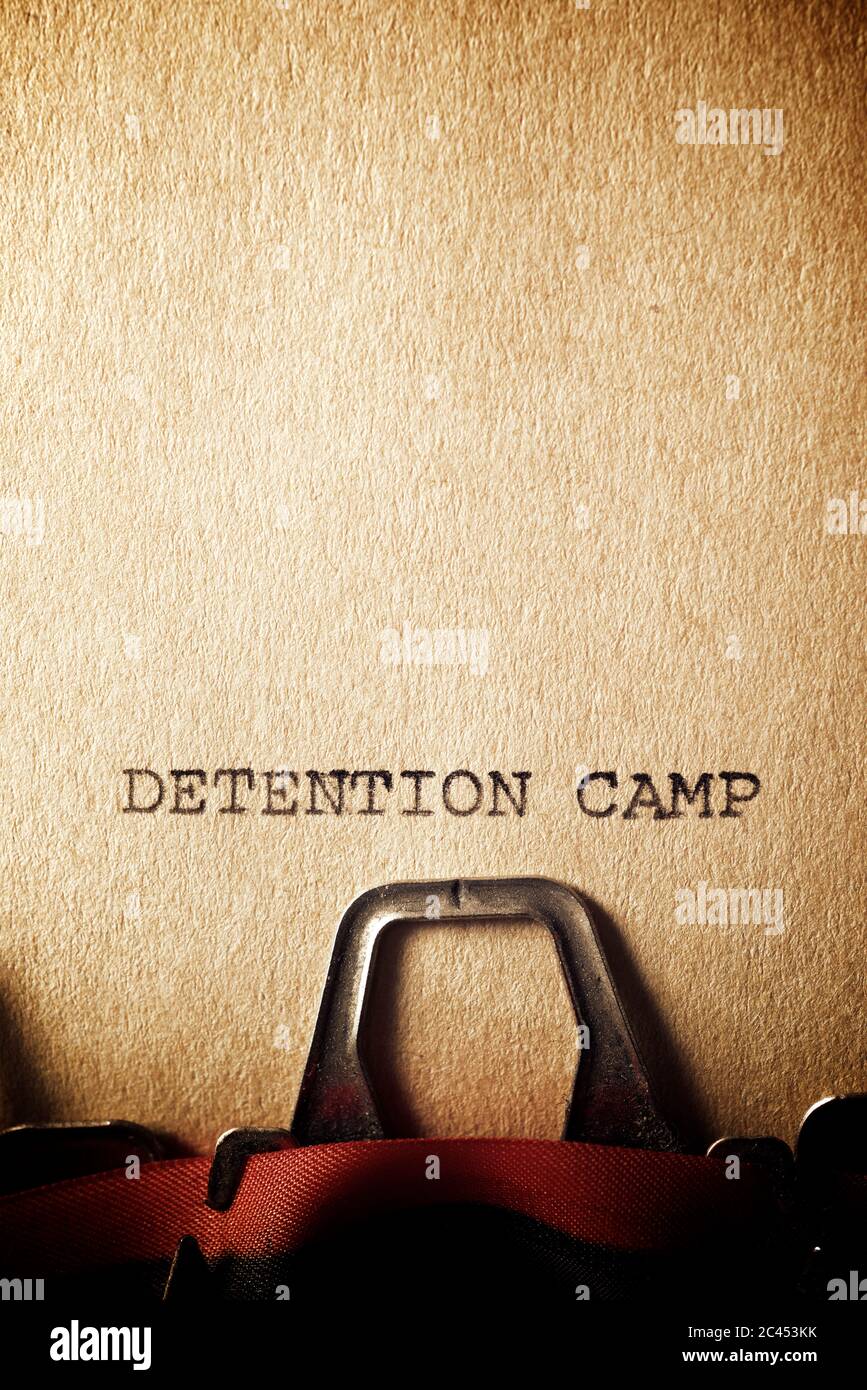 Detention camp text written on a paper Stock Photo - Alamy