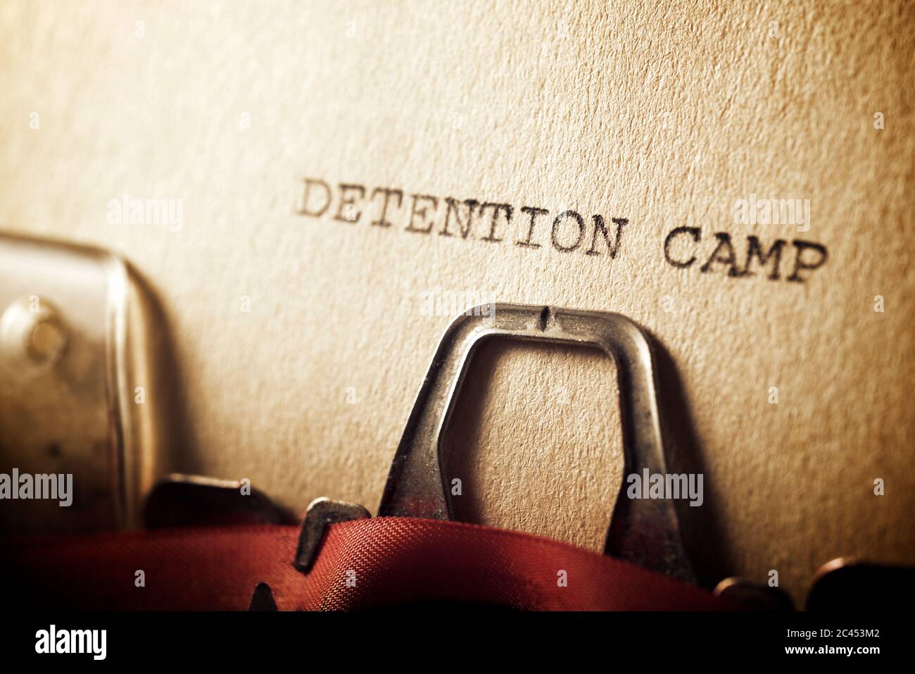 Detention camp text written on a paper Stock Photo - Alamy