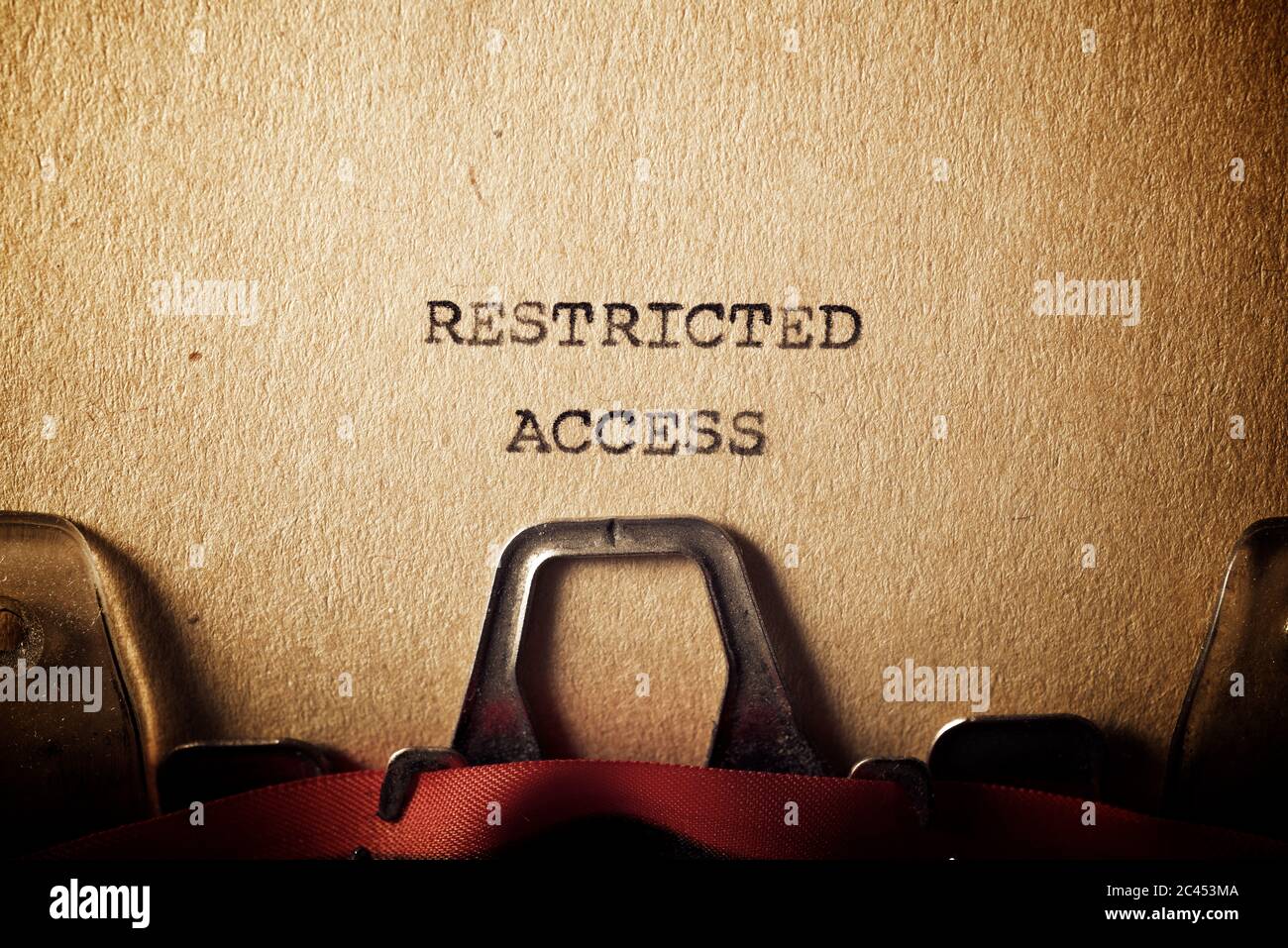 Restricted access text written on a paper Stock Photo - Alamy
