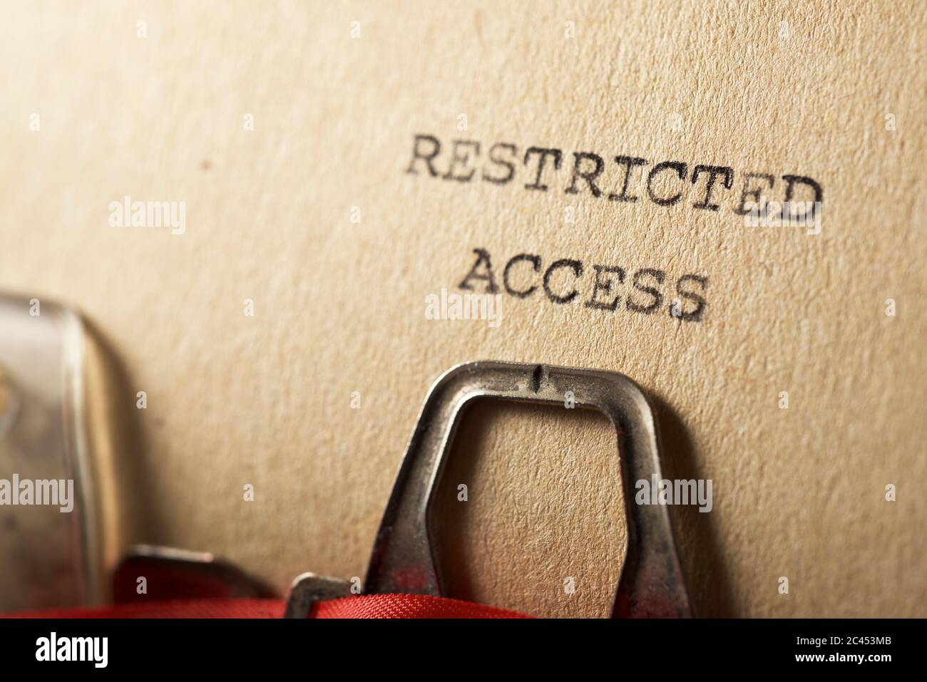 Restricted access text written on a paper Stock Photo - Alamy