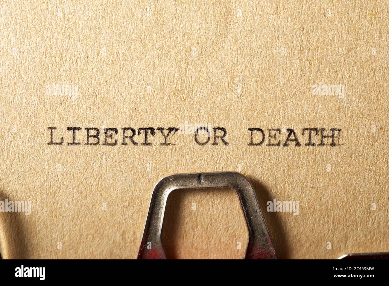 Liberty or death text written on a paper Stock Photo - Alamy